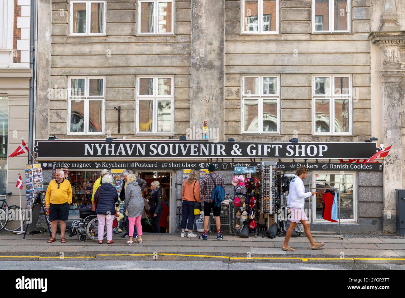 People browsing for souvenirs and gifts at a souvenirs store in ...