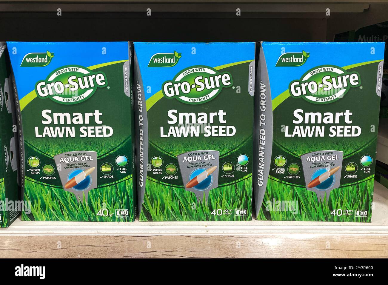 Boxes of Lawn Seed for sale at the local garden centre Stock Photo - Alamy