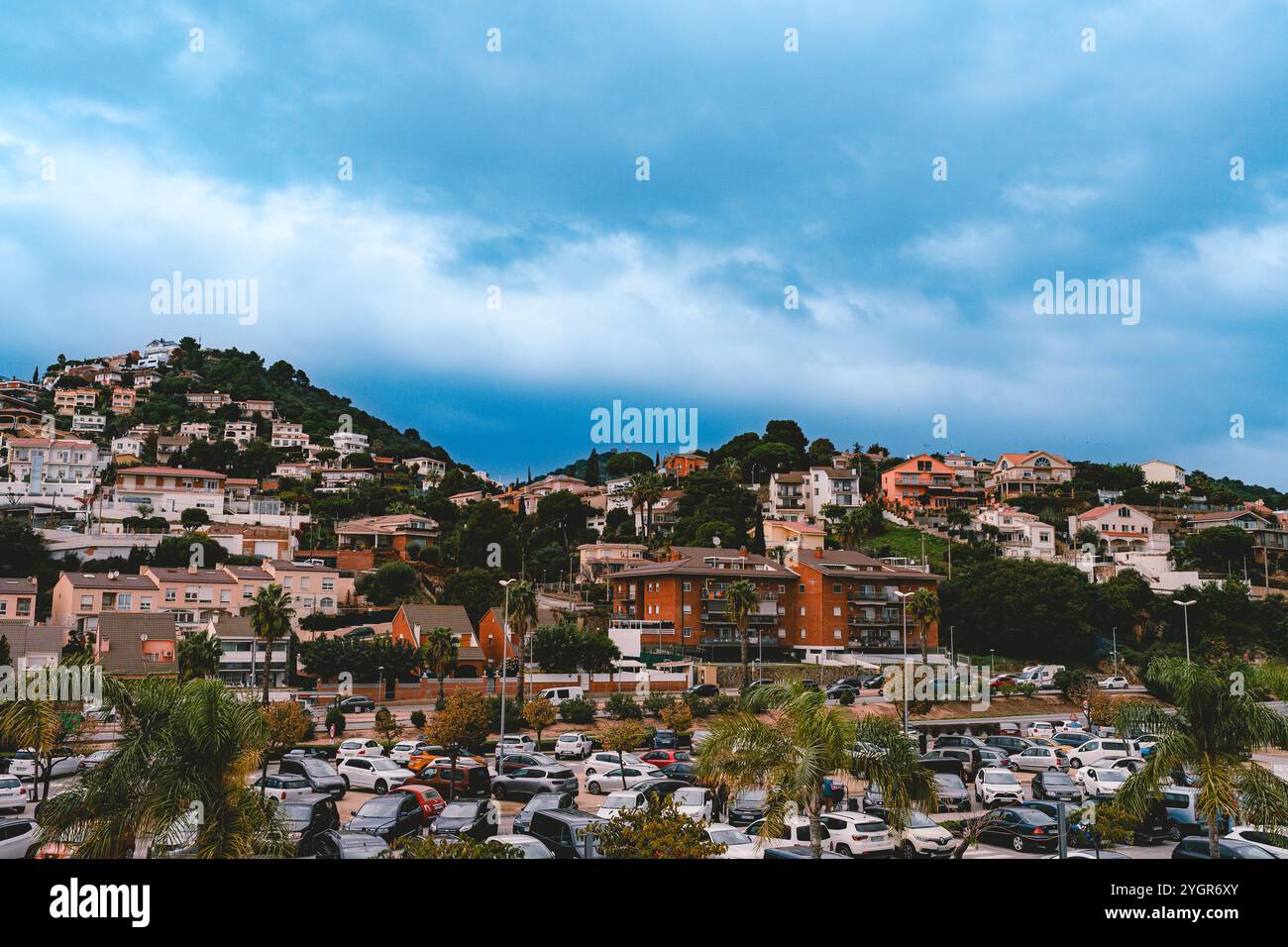 Charming hillside views of a peaceful Spanish town, where colorful ...
