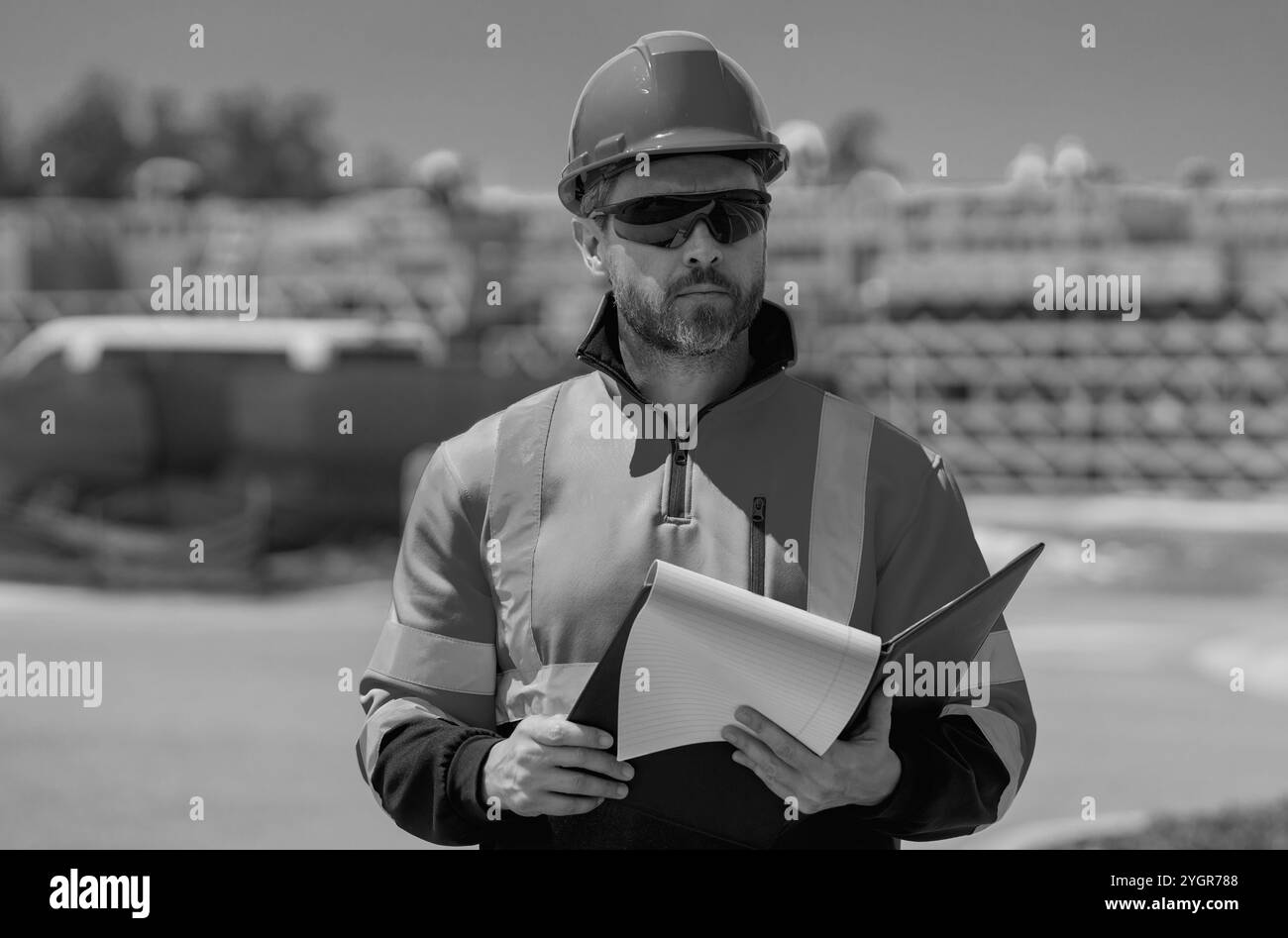 Professional construction worker in new house. Portrait of worker man ...