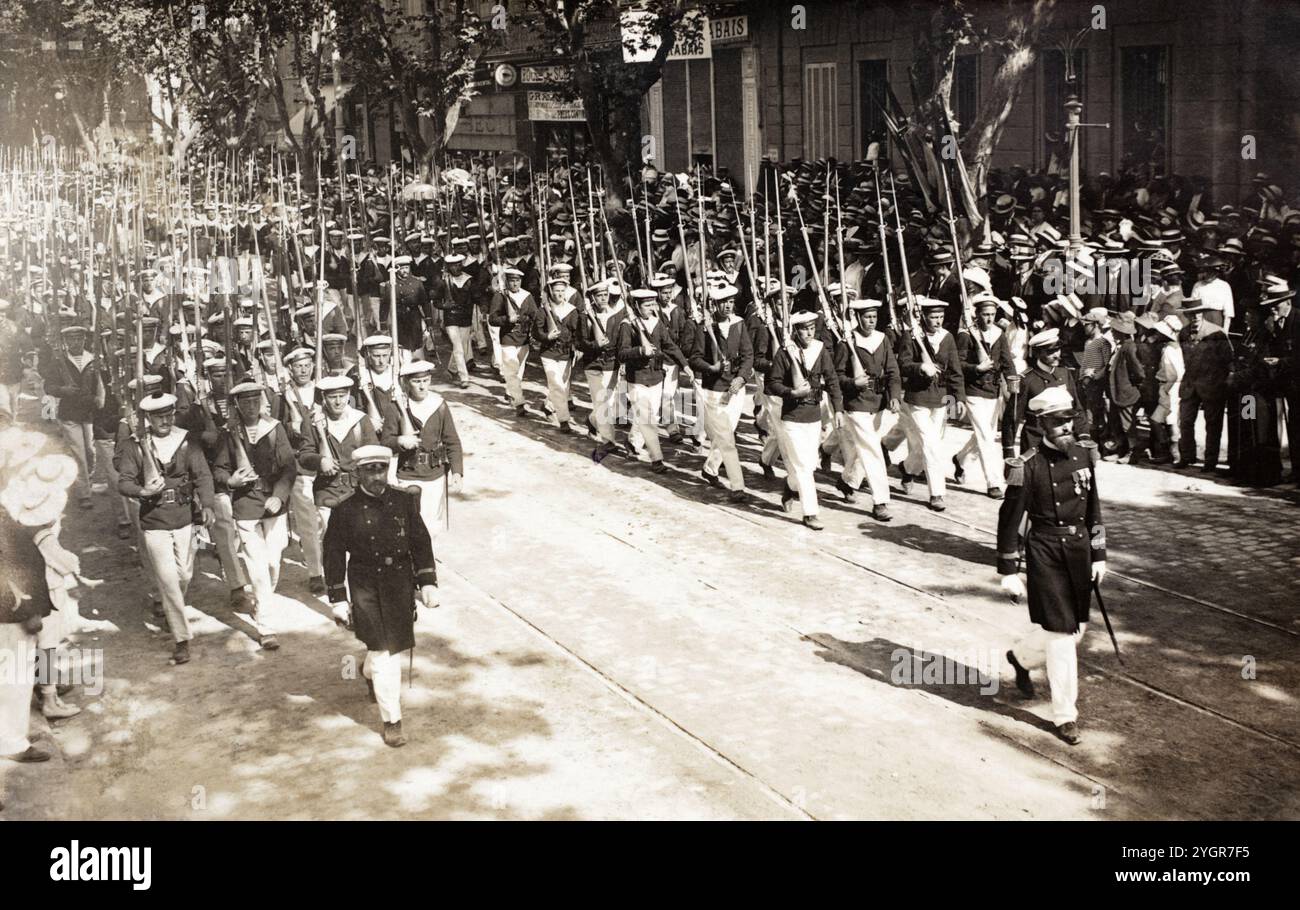 French sailors with Lebel rifles and fixed bayonets marching through a ...