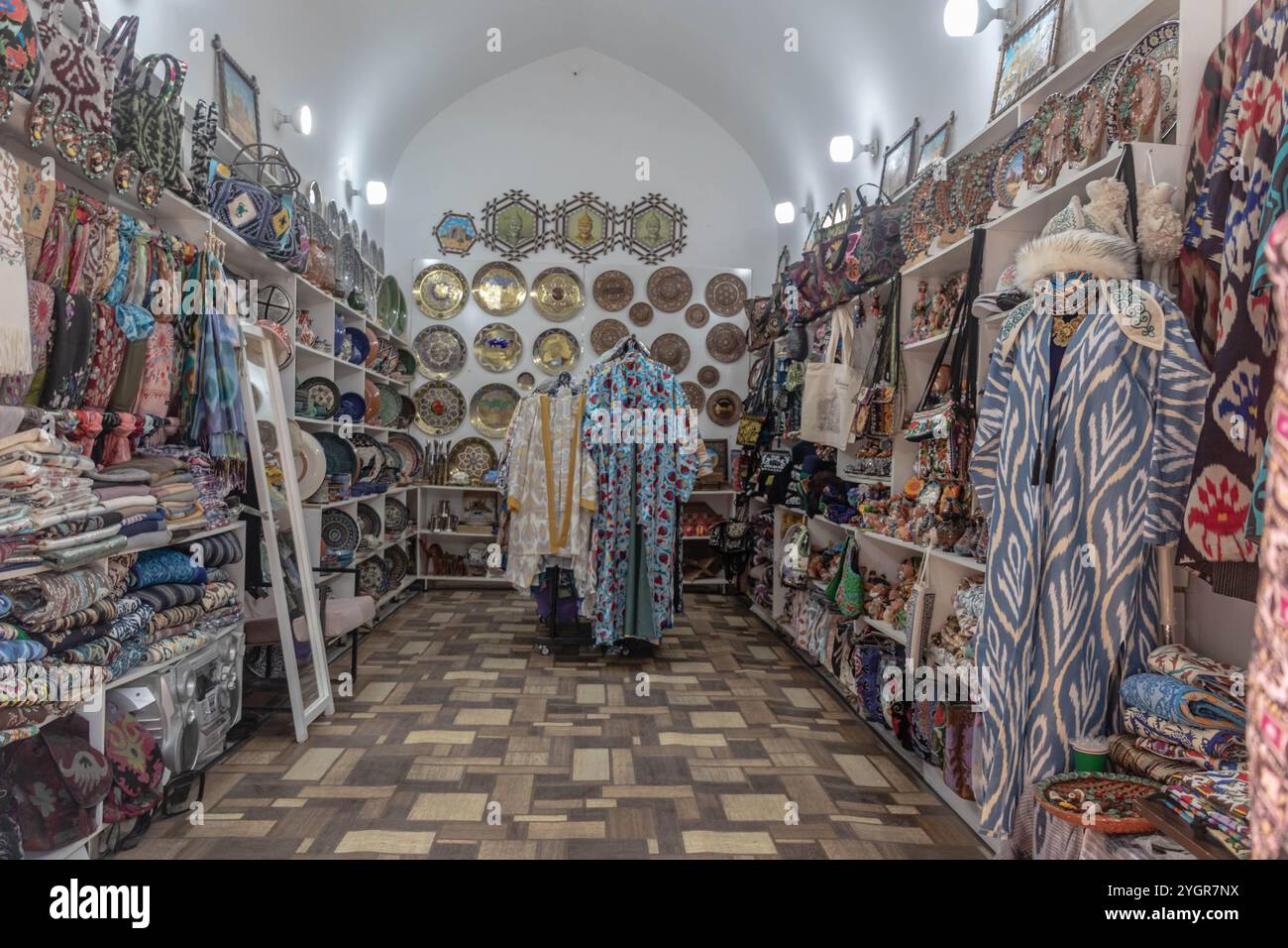 Uzbekistan Samarkand, souvenir shop with ceramics and fabrics in ...