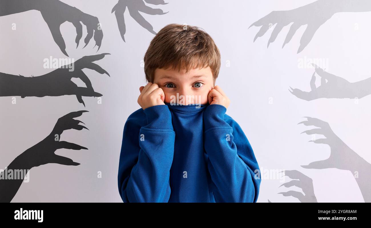 Teraphobia - fear of monsters. Scared boy and silhouettes of creepy ...