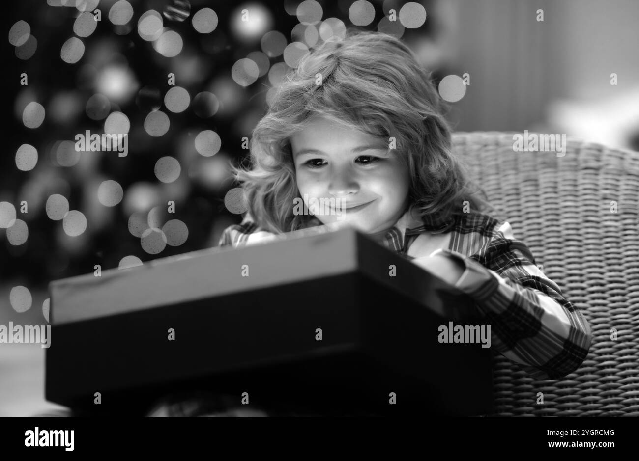 Christmas present happy child Black and White Stock Photos & Images - Alamy