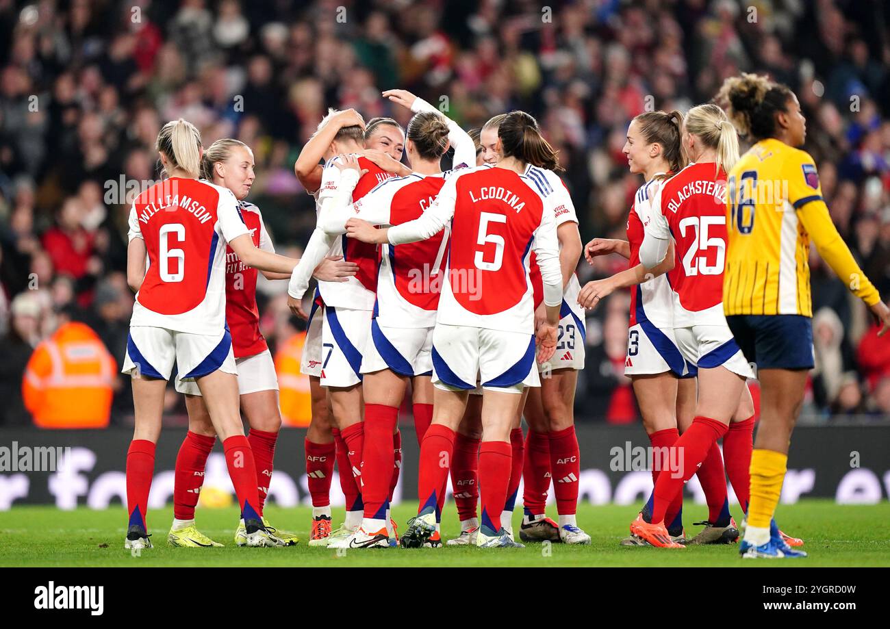 Arsenal's Lina Hurtig (hidden) celebrates scoring their side's fourth ...