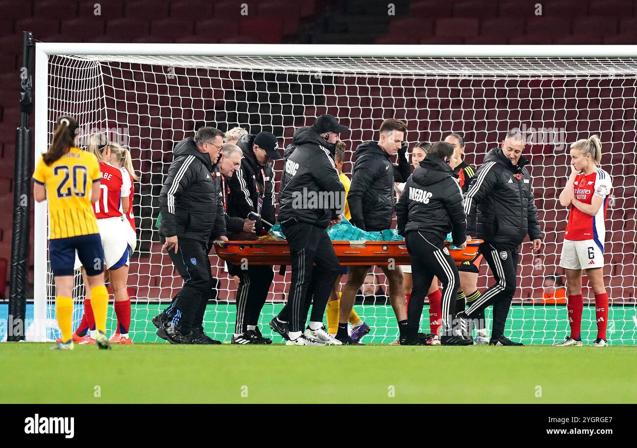 Brighton and Hove Albion's Aisha Masaka is stretched off after picking ...