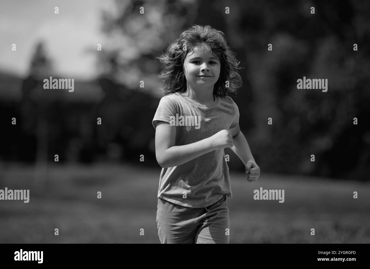 Kid running in summer street. Child enjoy run. Little boy running on ...
