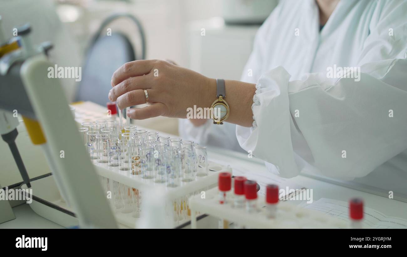 Blood sampling into test tubes. Test tubes with blood. Chemistry ...