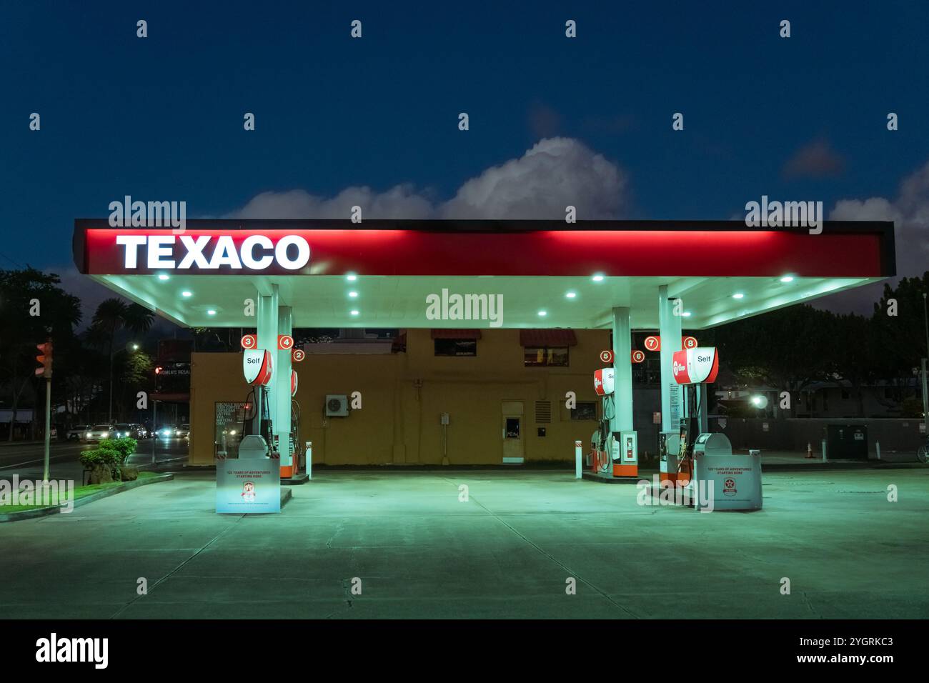 Honolulu, HI, US-October 29, 2023: Texaco gas station at night with ...