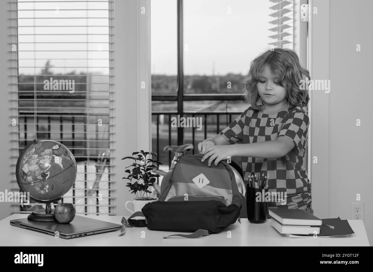 Child rucksack home Black and White Stock Photos & Images - Alamy
