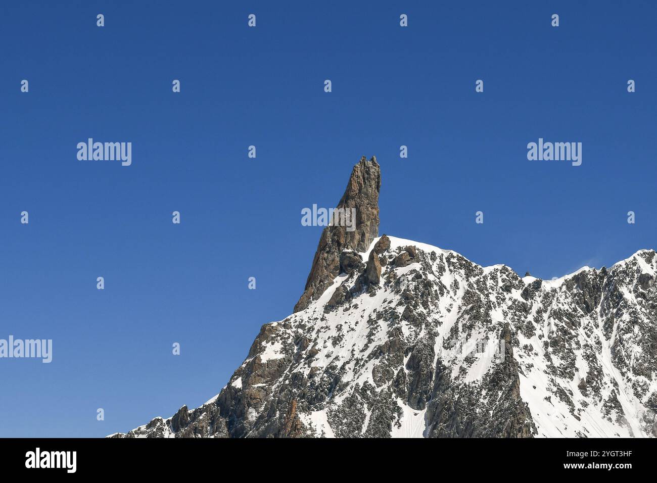 The sharp pinnacle of the Dente del Gigante (Dent du Geant in French ...