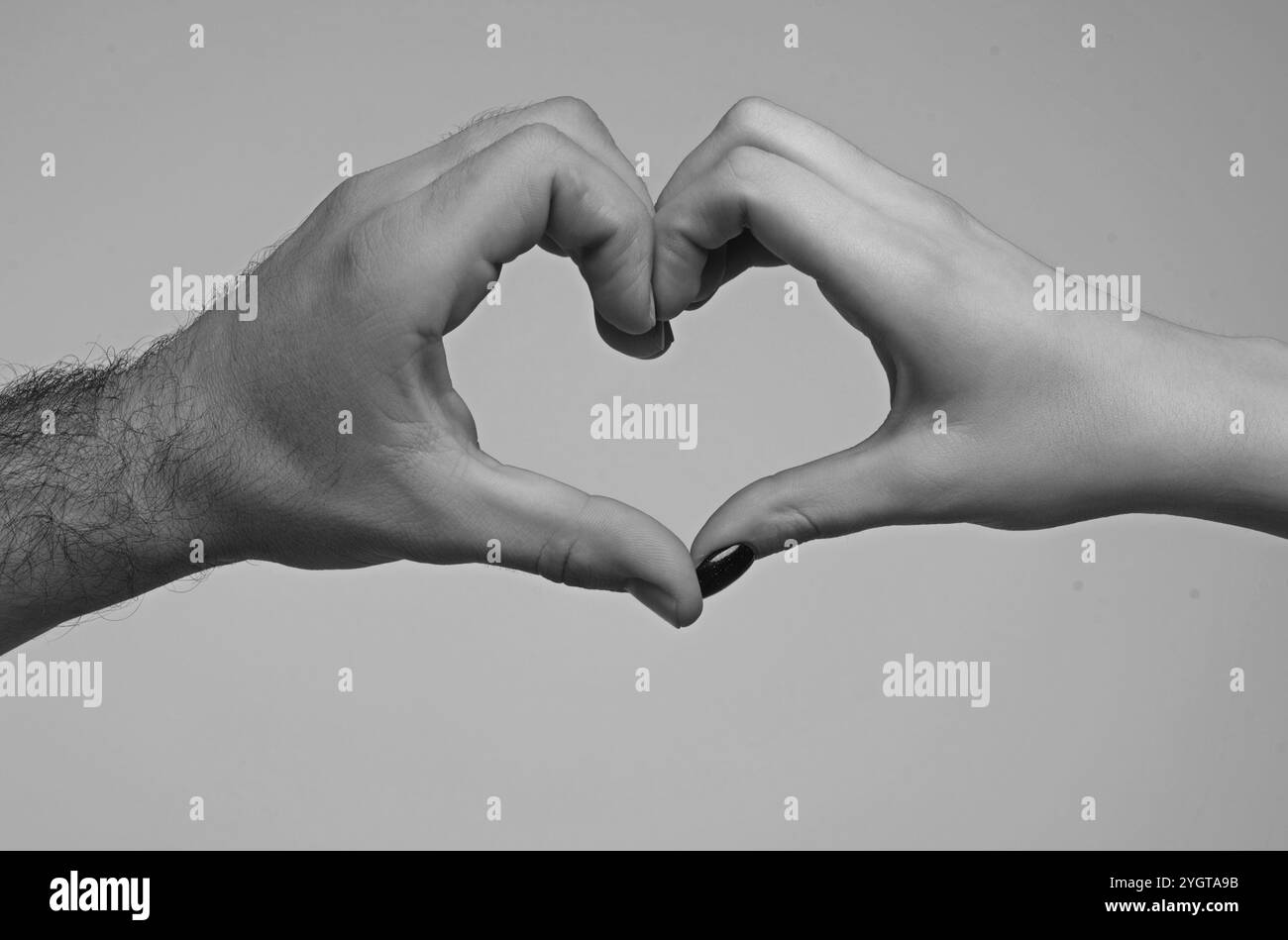 Female and male hands in form of heart. Hands in shape of love hearts ...