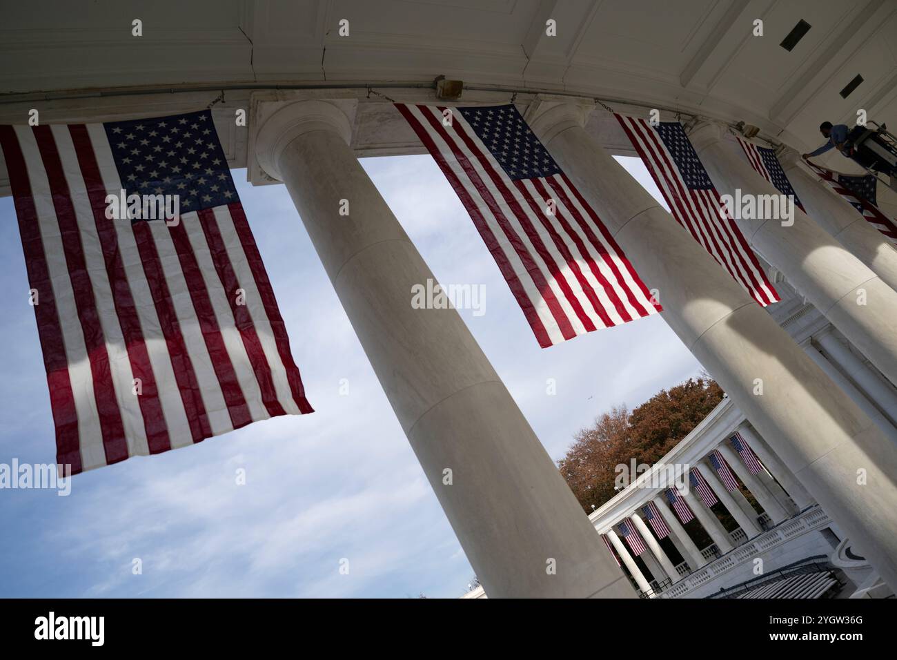 Arlington National Cemetery Facilities Maintenance employees hang U.S ...