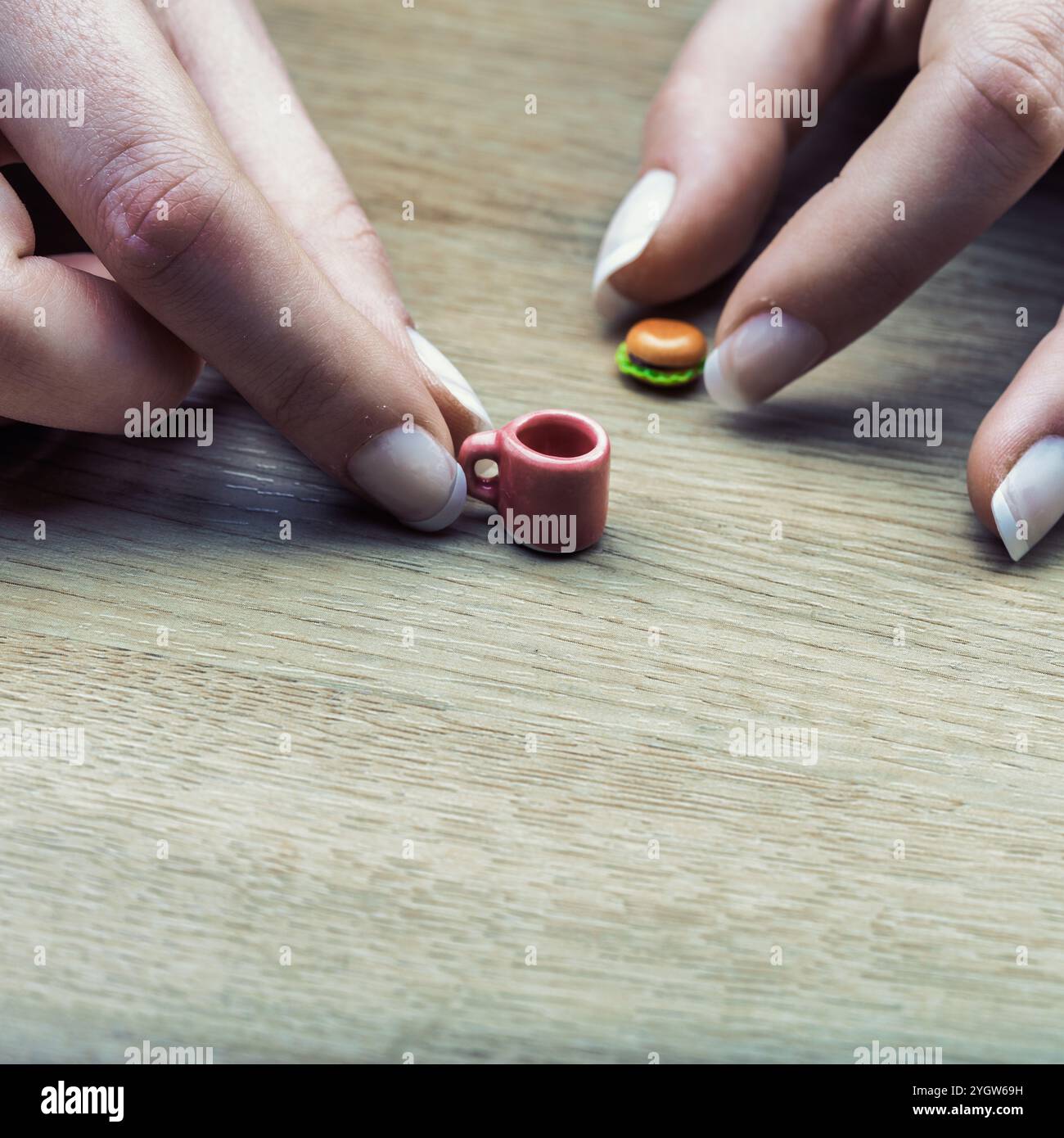 tiny coffee and burger emphasize portion control’s challenge. Although ...