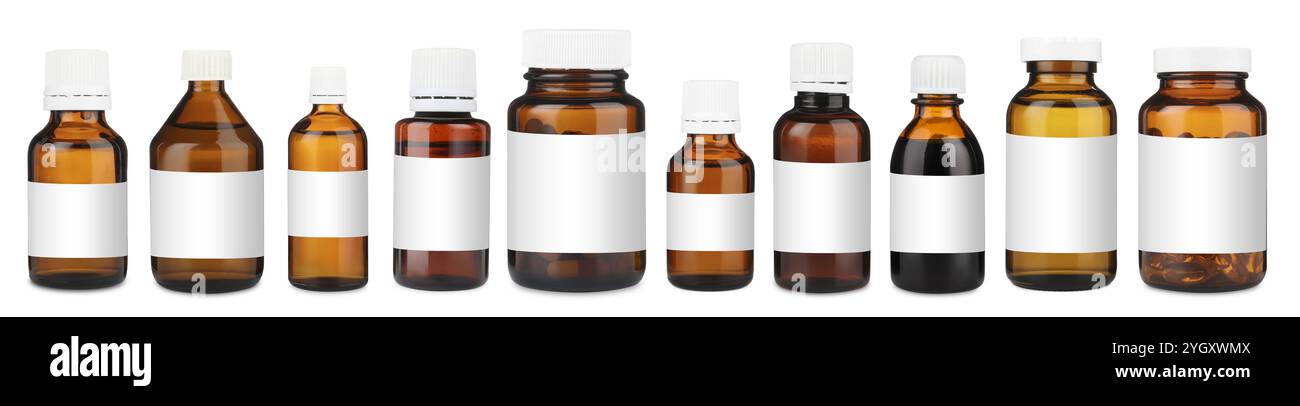 Many different glass bottles with labels isolated on white Stock Photo ...
