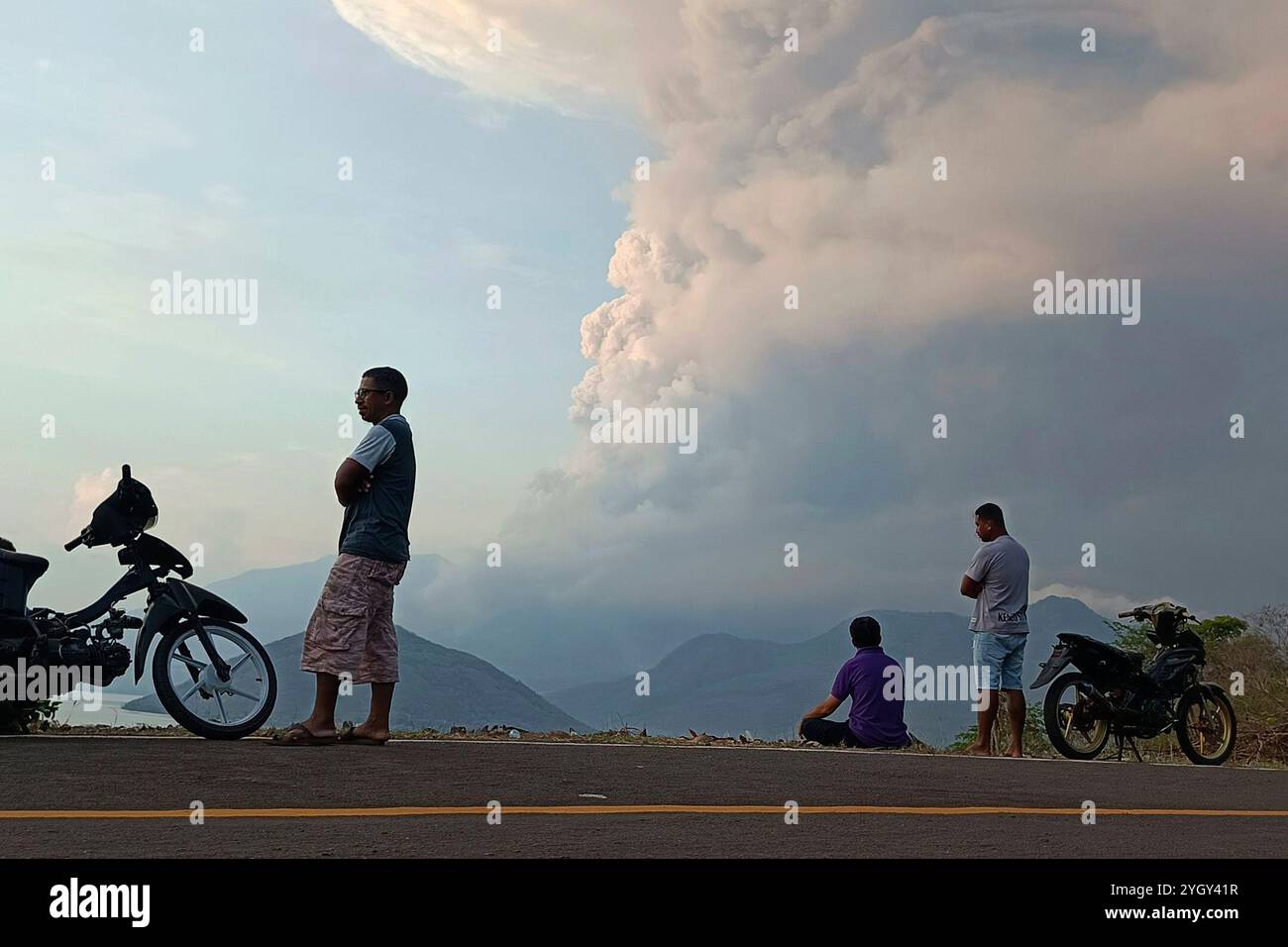 Residents watch as Mount Lewotobi Laki Laki volcano spews volcanic ...