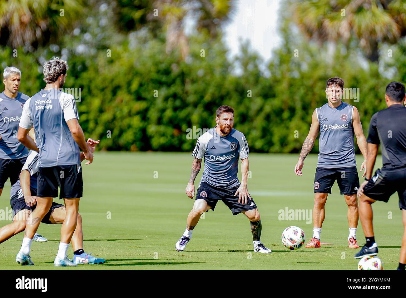 Argentine forward #10 Lionel Messi (R) trains with teammates at the ...