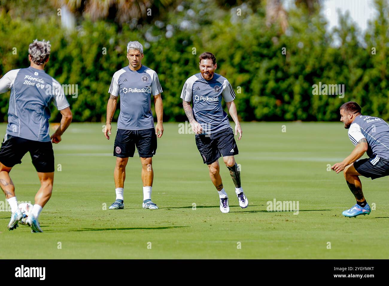 Argentine forward #10 Lionel Messi (R) trains with teammates at the ...