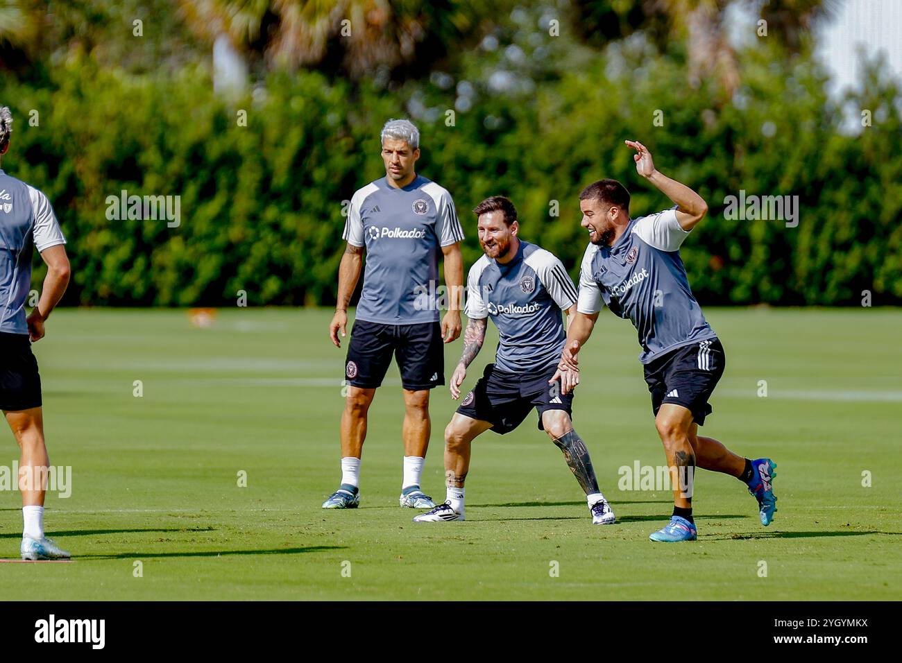Argentine forward #10 Lionel Messi (R) trains with teammates at the ...
