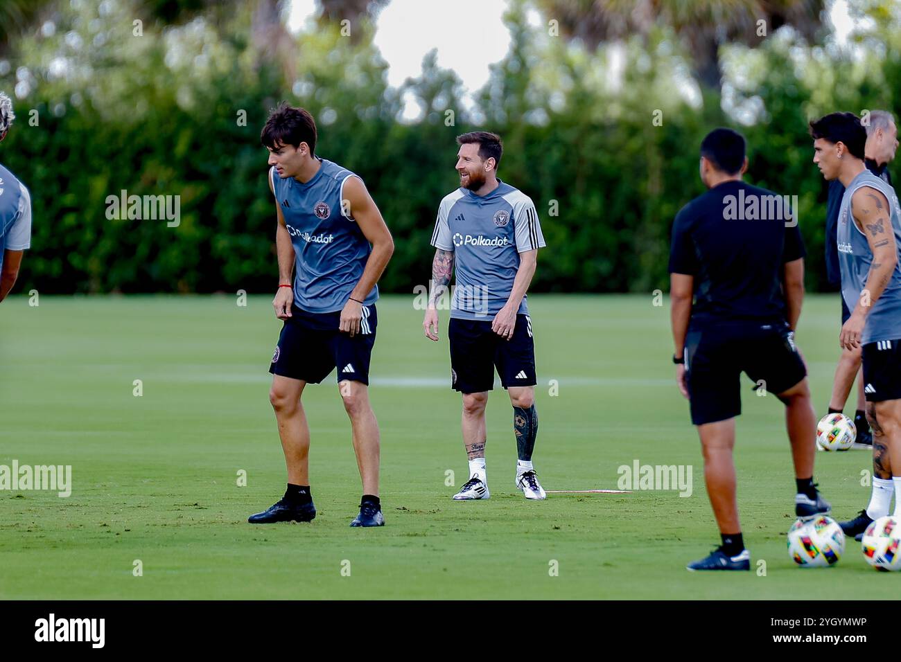 Argentine forward #10 Lionel Messi (R) trains with teammates at the ...