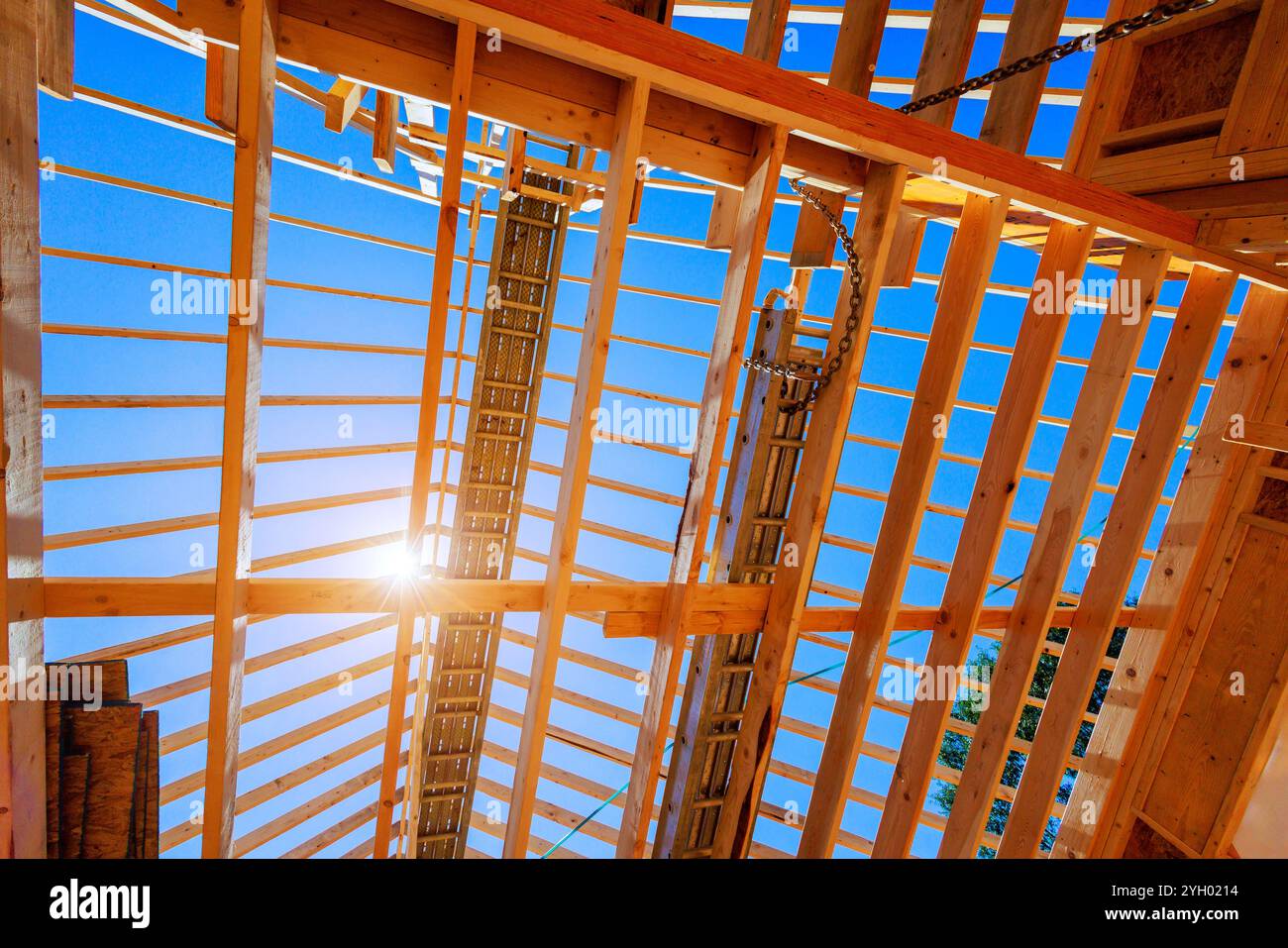 Building roof framing of building roof, featuring intersecting wooden ...