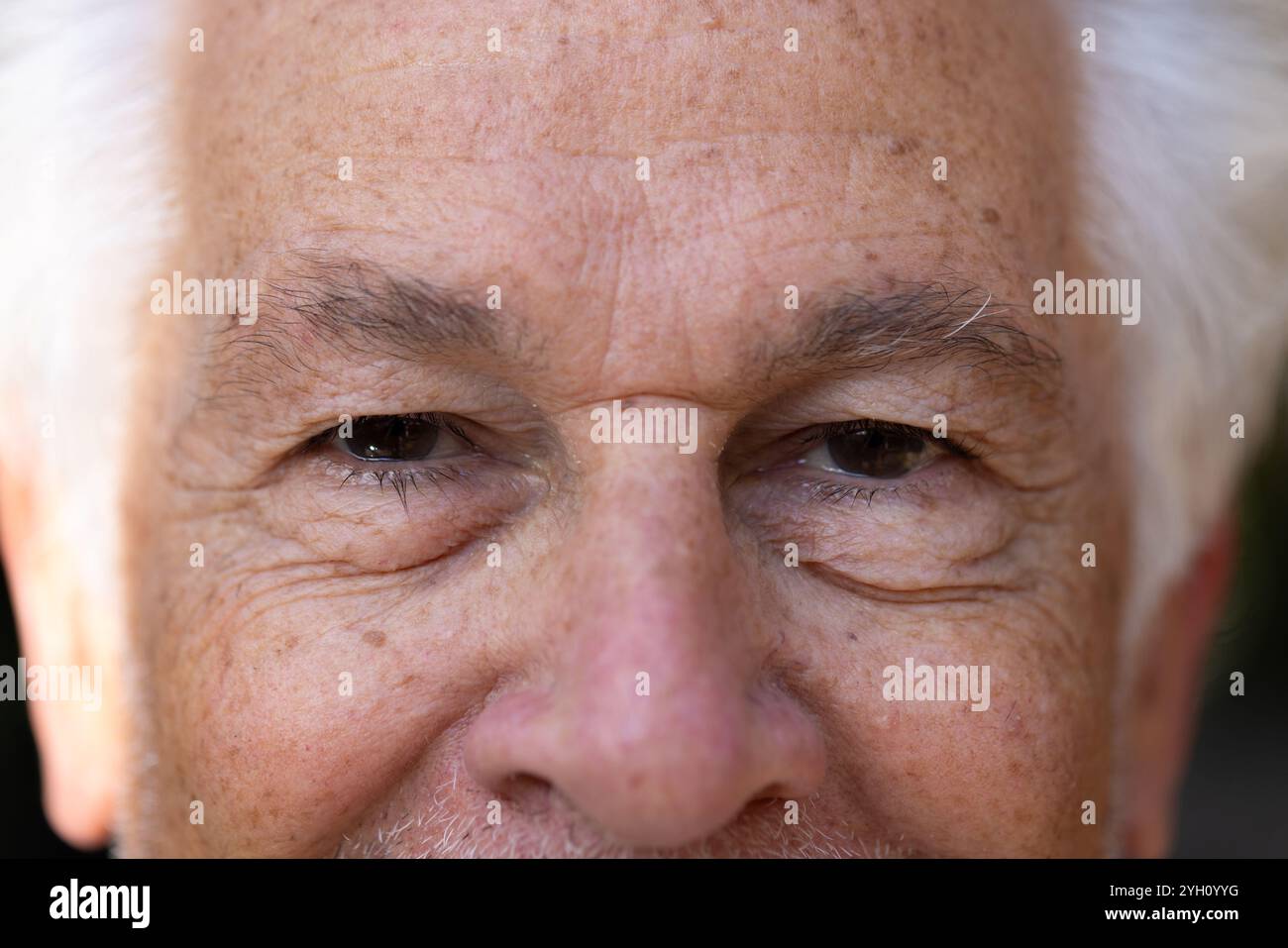 Close up serious man eyes hi-res stock photography and images - Alamy