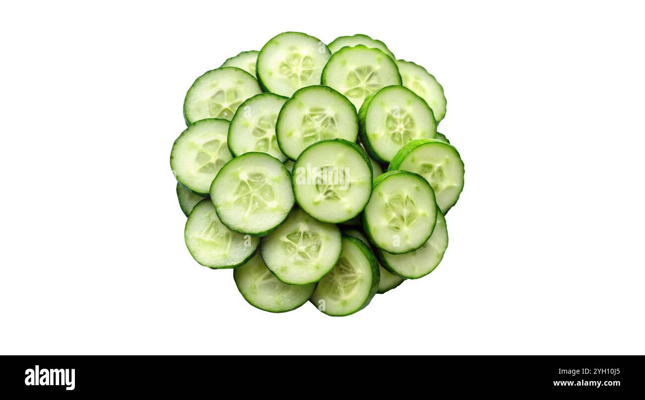 Pile up sliced cucumber top view on white background Stock Photo - Alamy