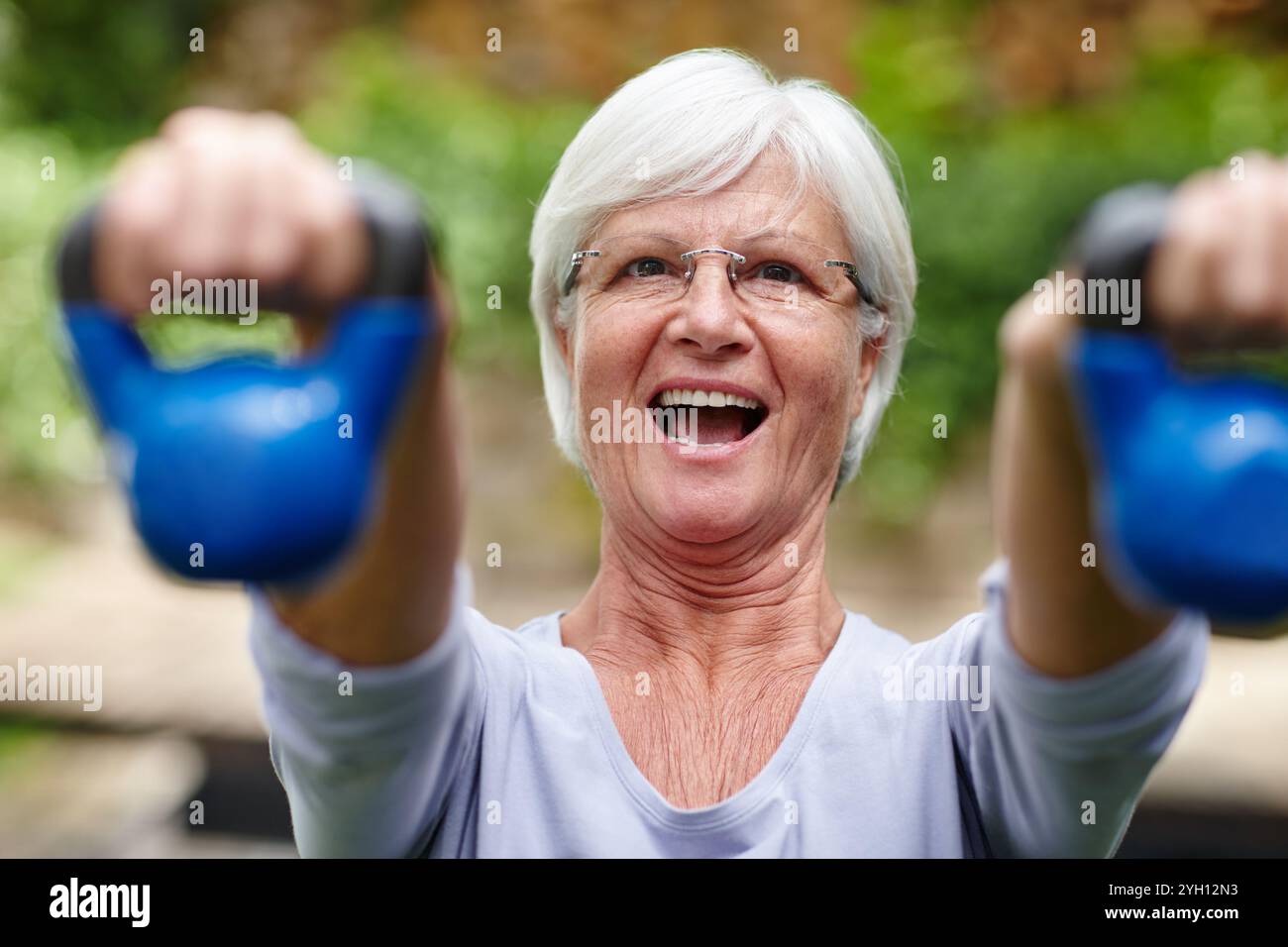 Old woman, kettlebell and outdoor exercise in portrait, active and ...