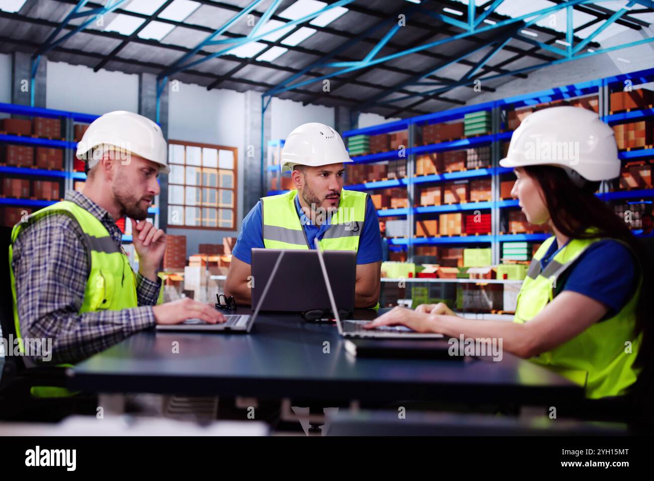 Team Meeting At Logistic Delivery Center Warehouse Stock Photo - Alamy
