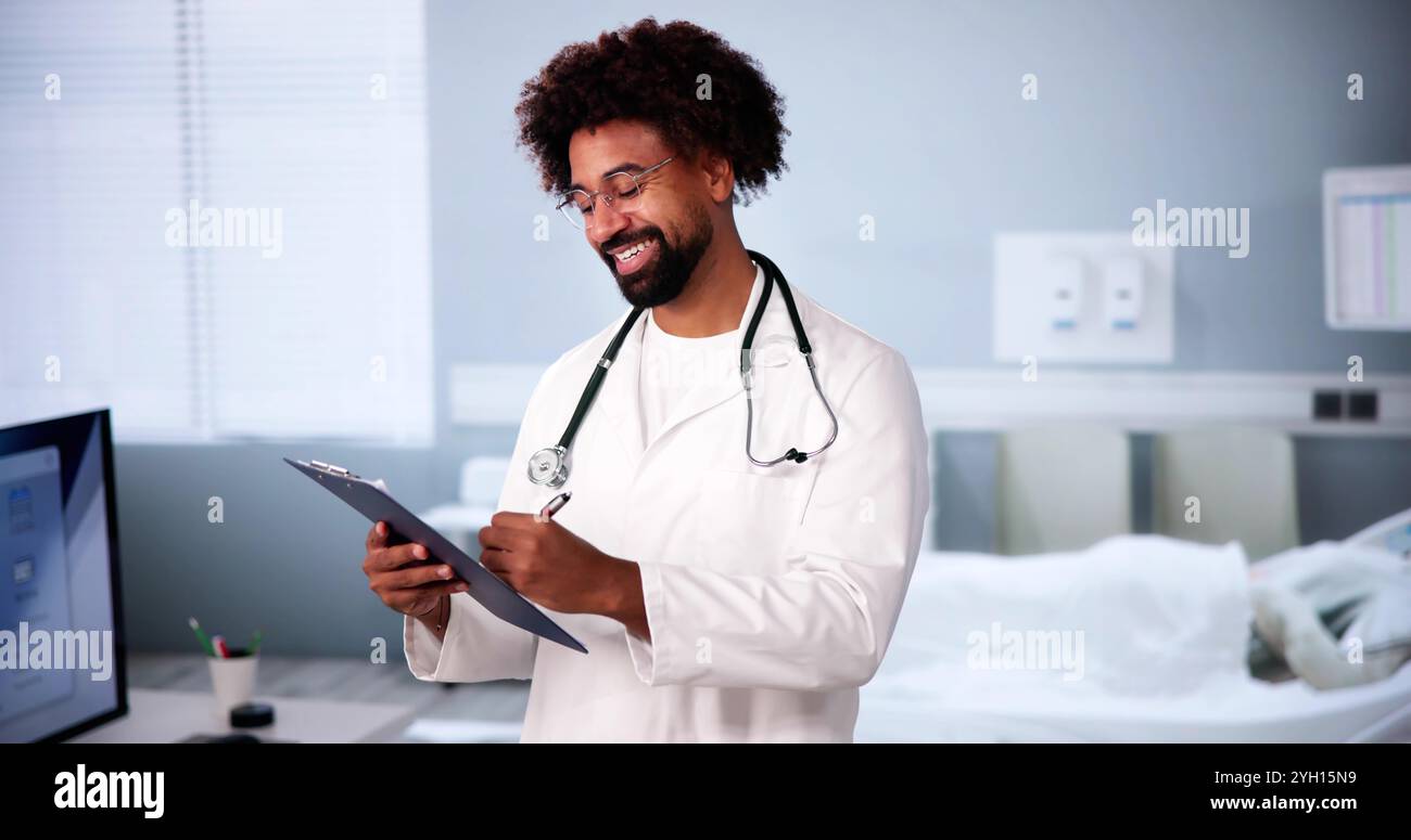 African american doctor writing checkup hi-res stock photography and ...