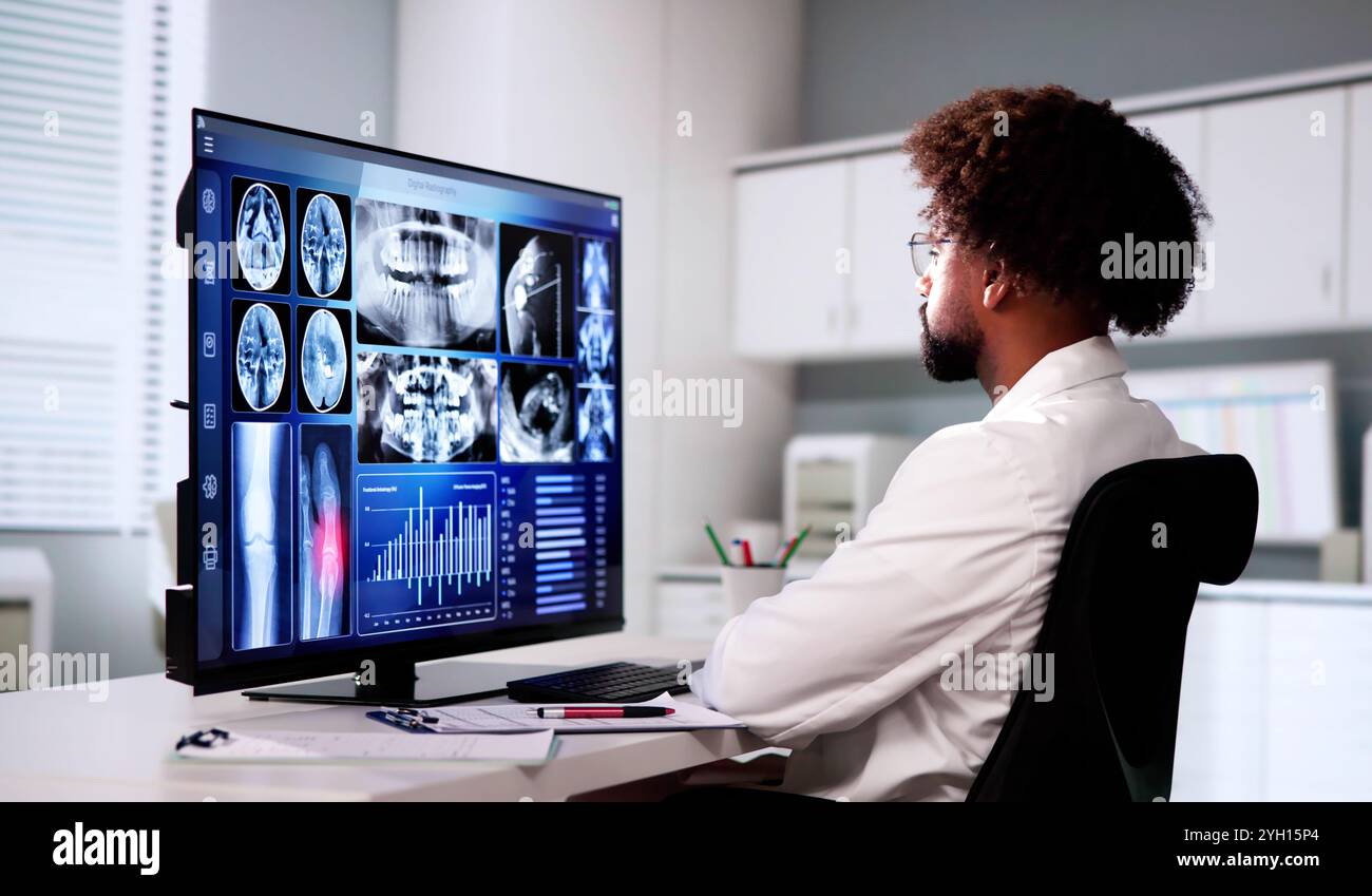Radiologist Dentist Using X Ray Software On Desktop Computer Stock ...