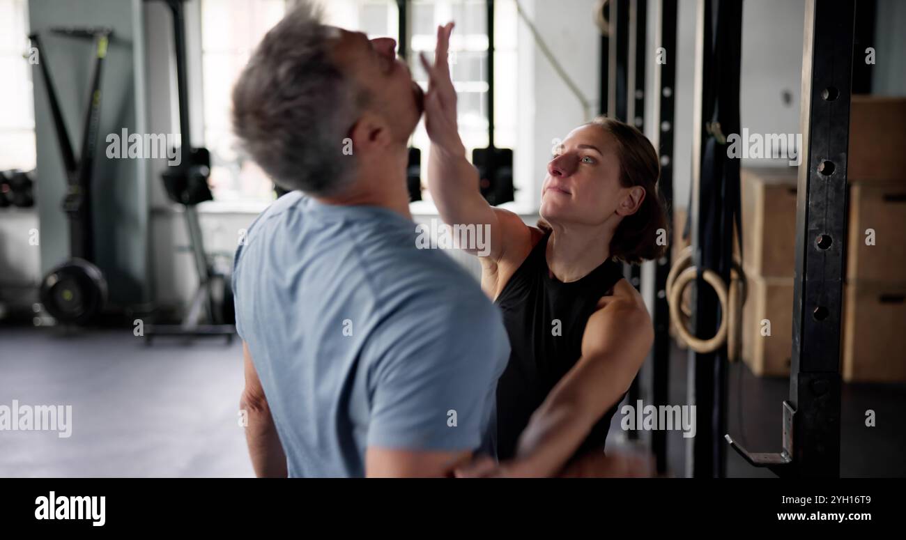 Self Defense Safety Class With Personal Trainer. Woman Learning Fight ...