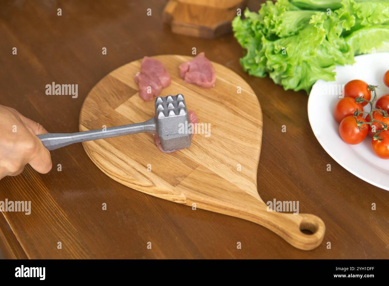 Man hands cutting meat dish hi-res stock photography and images - Alamy