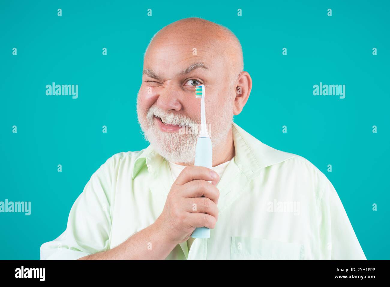 Brushing teeth. Senior holding toothbrush for tooth brushing. Dentistry ...