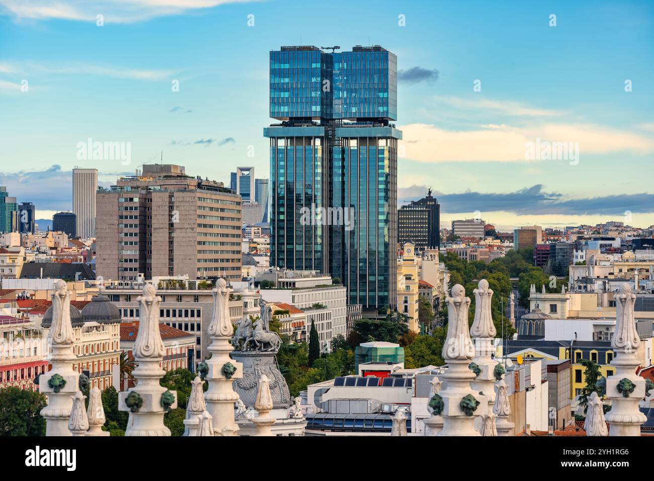 Steel and glass towers and historic stone buildings in Madrid's capital ...