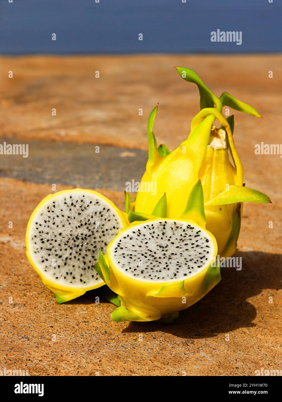 Yellow Dragon Fruit on a Rustic Surface Stock Photo - Alamy