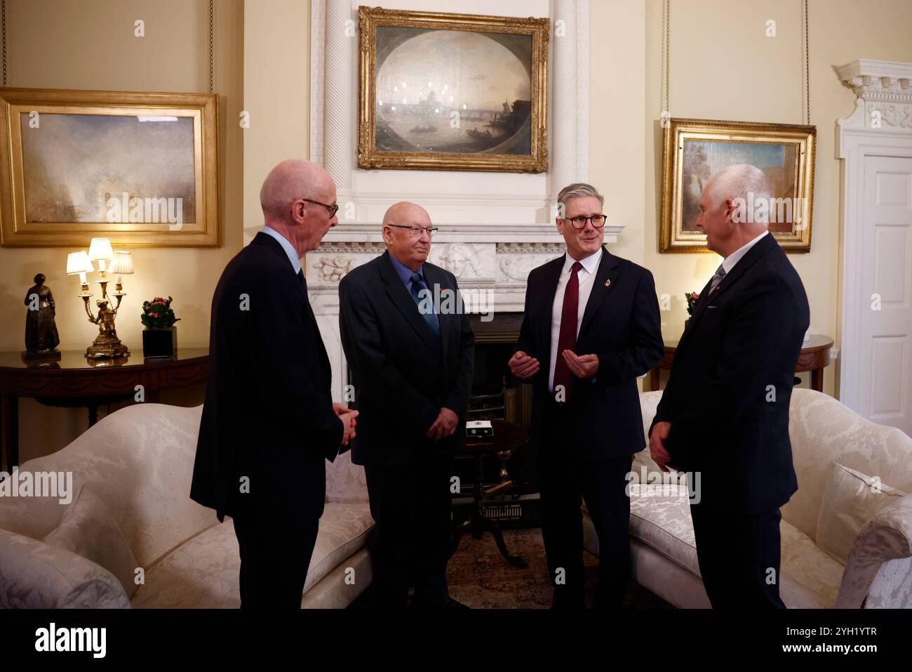 Prime Minister Sir Keir Starmer (second right) and Chancellor of the ...