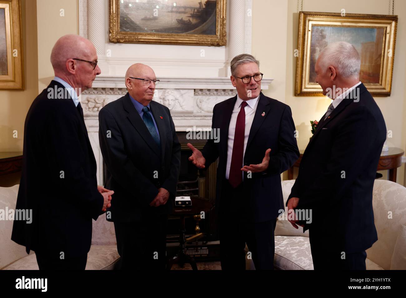 Prime Minister Sir Keir Starmer (second right) and Chancellor of the ...