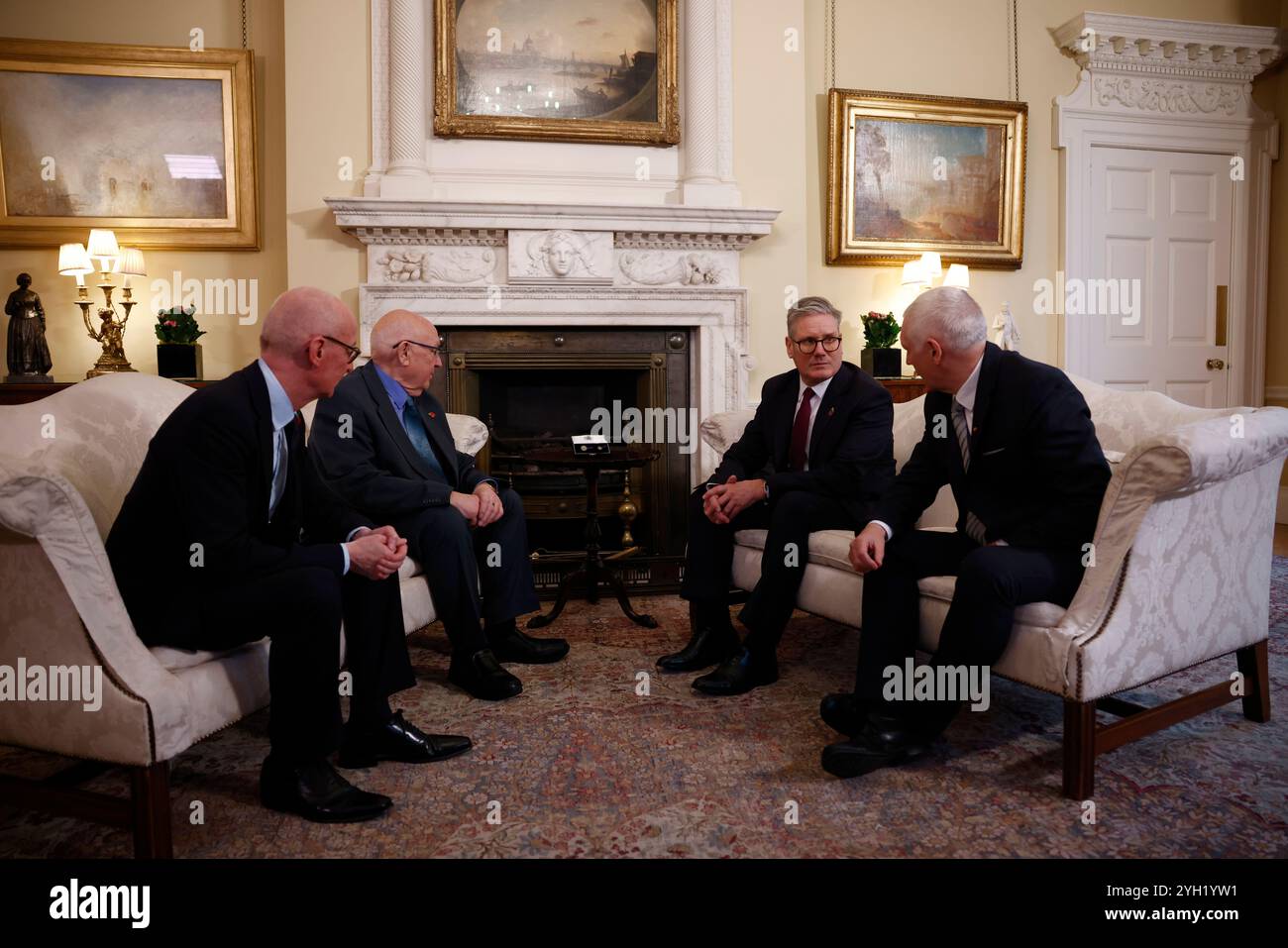 Prime Minister Sir Keir Starmer (second right) and Chancellor of the ...