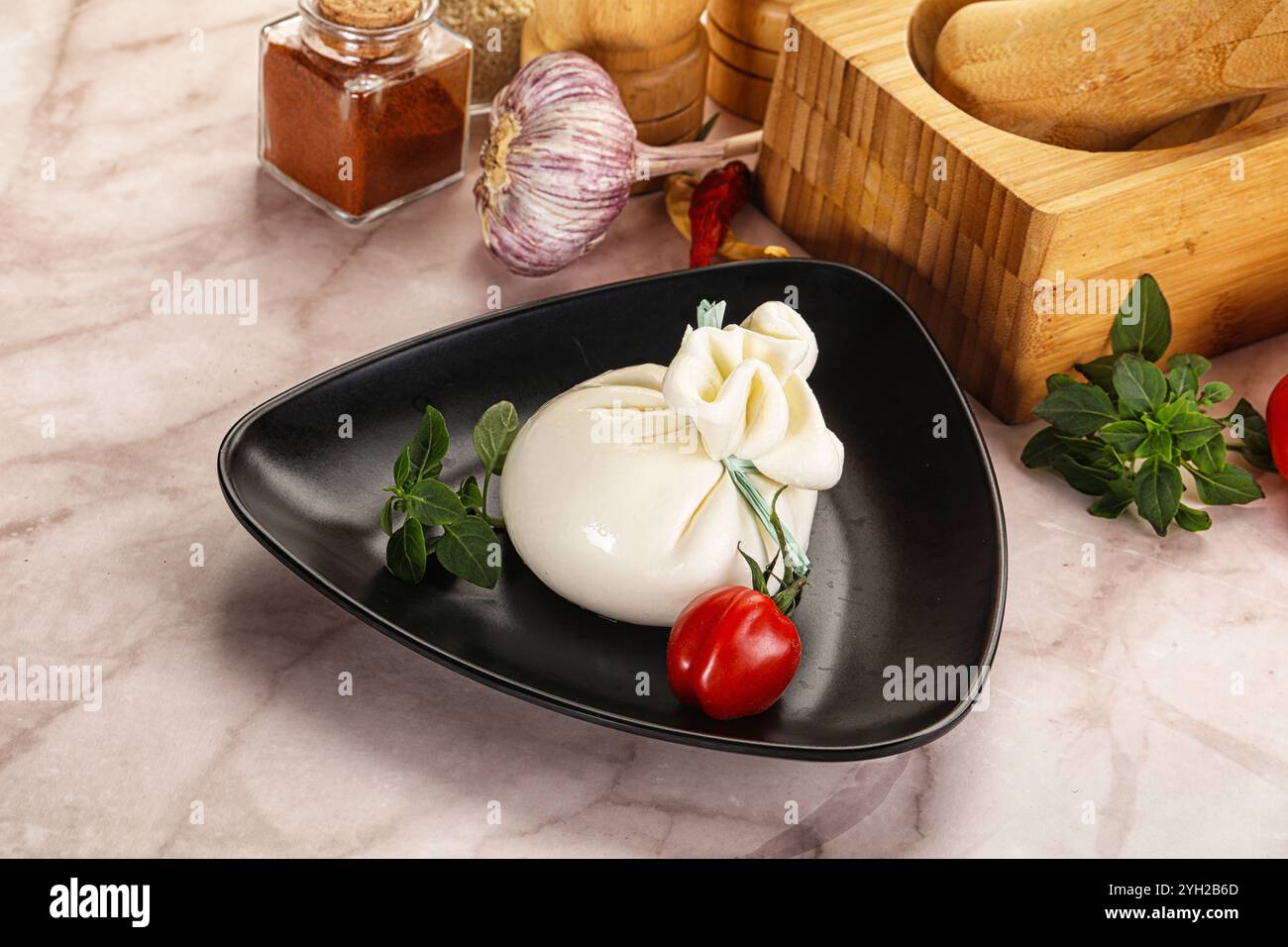 Italian dairy soft young cheese - Burrata Stock Photo - Alamy