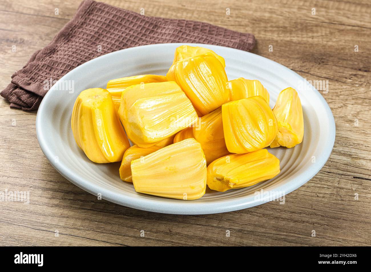 Raw ripe yellow jackfruit segment heap Stock Photo - Alamy