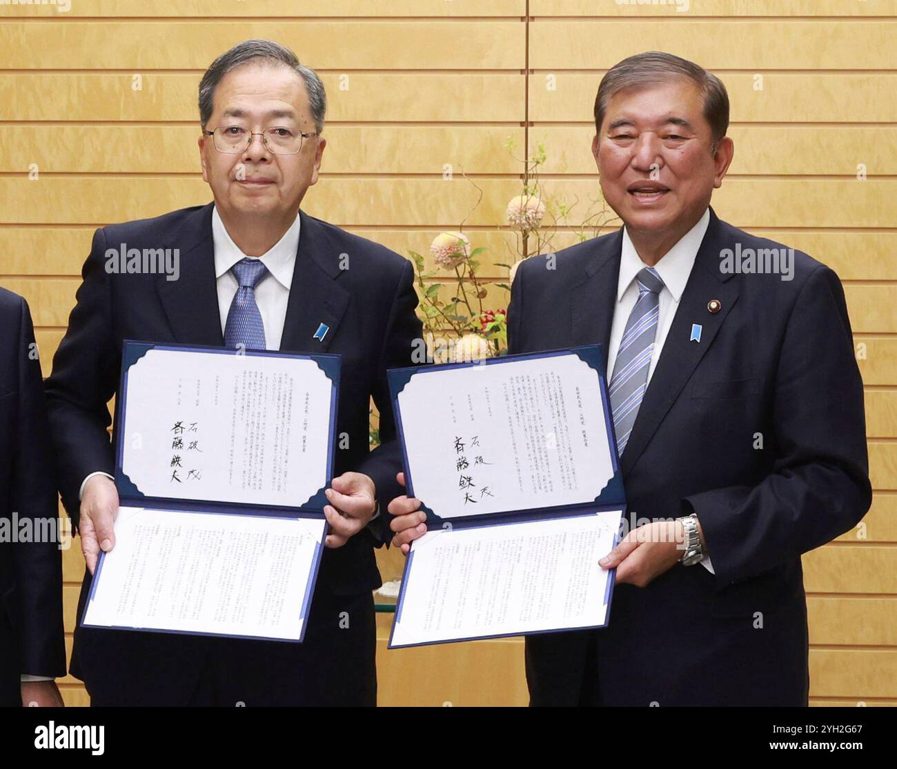 Japan's Prime Minister Shigeru Ishiba (right) and leader of Komeito ...