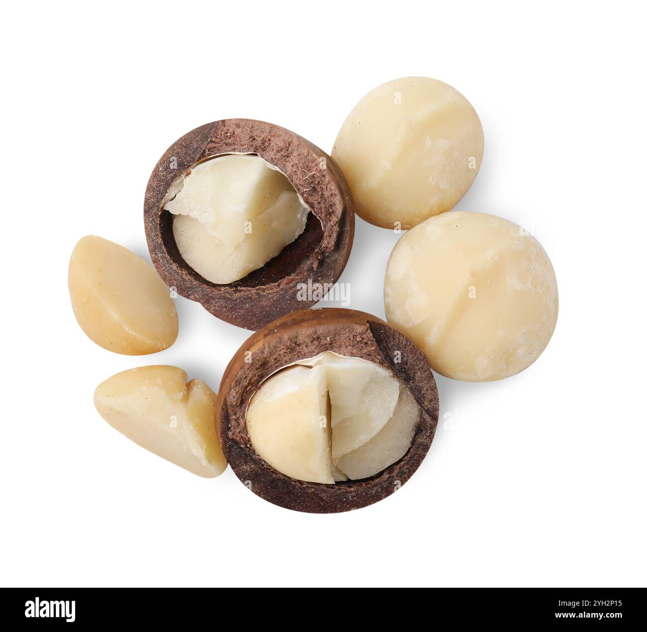 Macadamia nuts with shells isolated on white, top view Stock Photo - Alamy