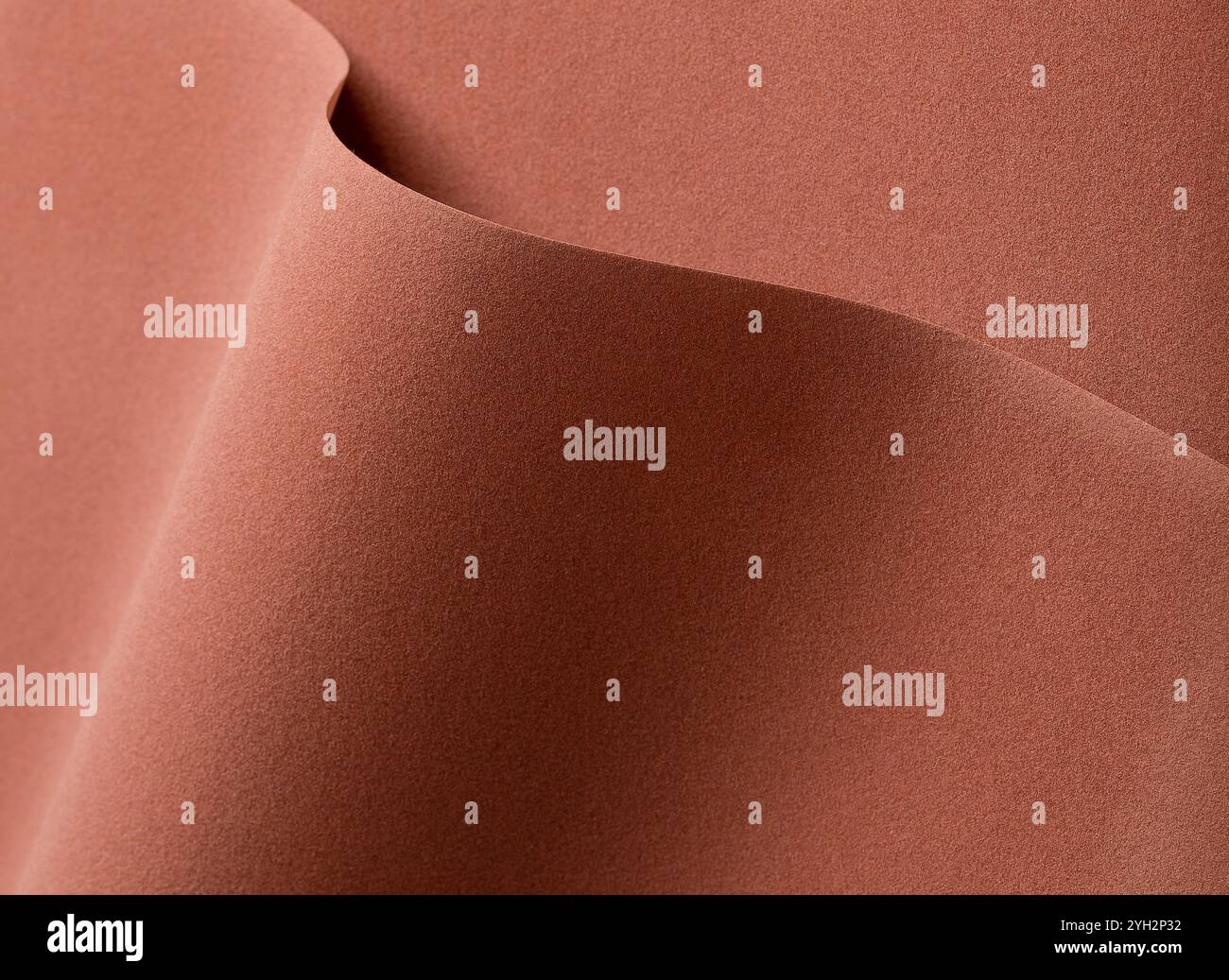 Designer paper background with a rich, velvety texture in warm earthy ...