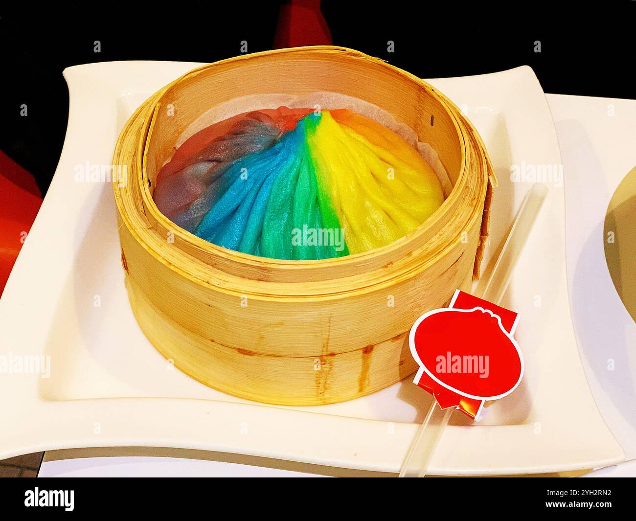 Rainbow Dumpling: A Fusion of Tradition and Art Stock Photo - Alamy