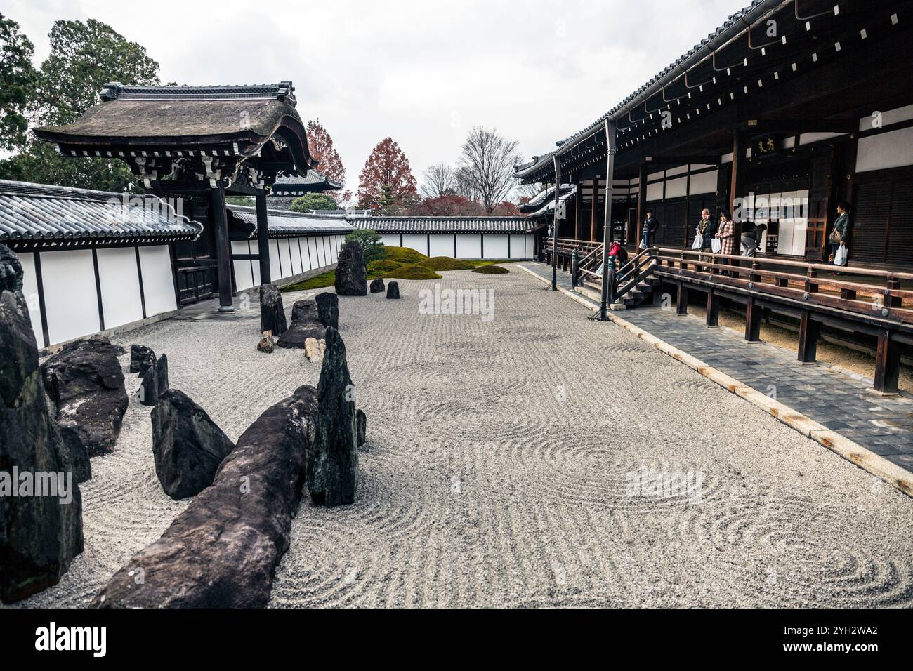 Traditional Japanese dry garden features meticulously raked sand ...