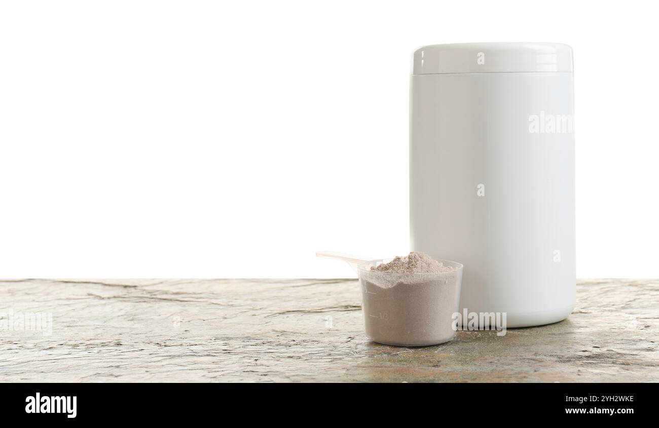 Protein powder on textured table against white background, space for ...