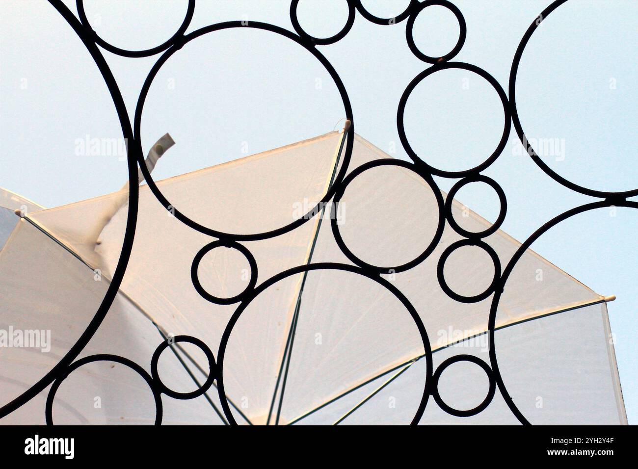 Abstract View Through Circular Metal Design Stock Photo - Alamy