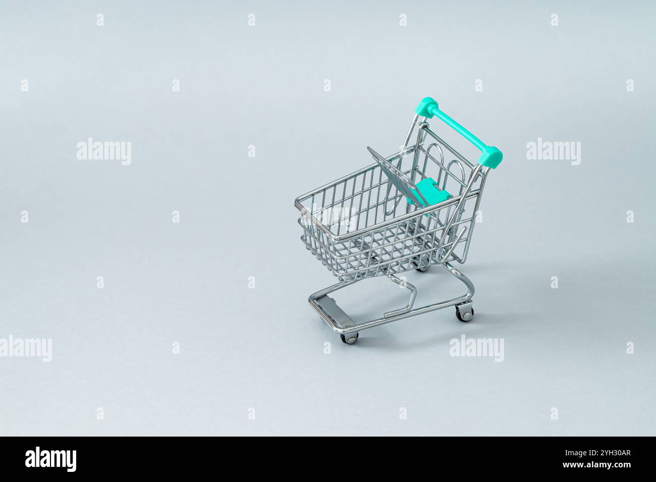 Shopping cart on grey background. Creative shopping backdrop concept ...