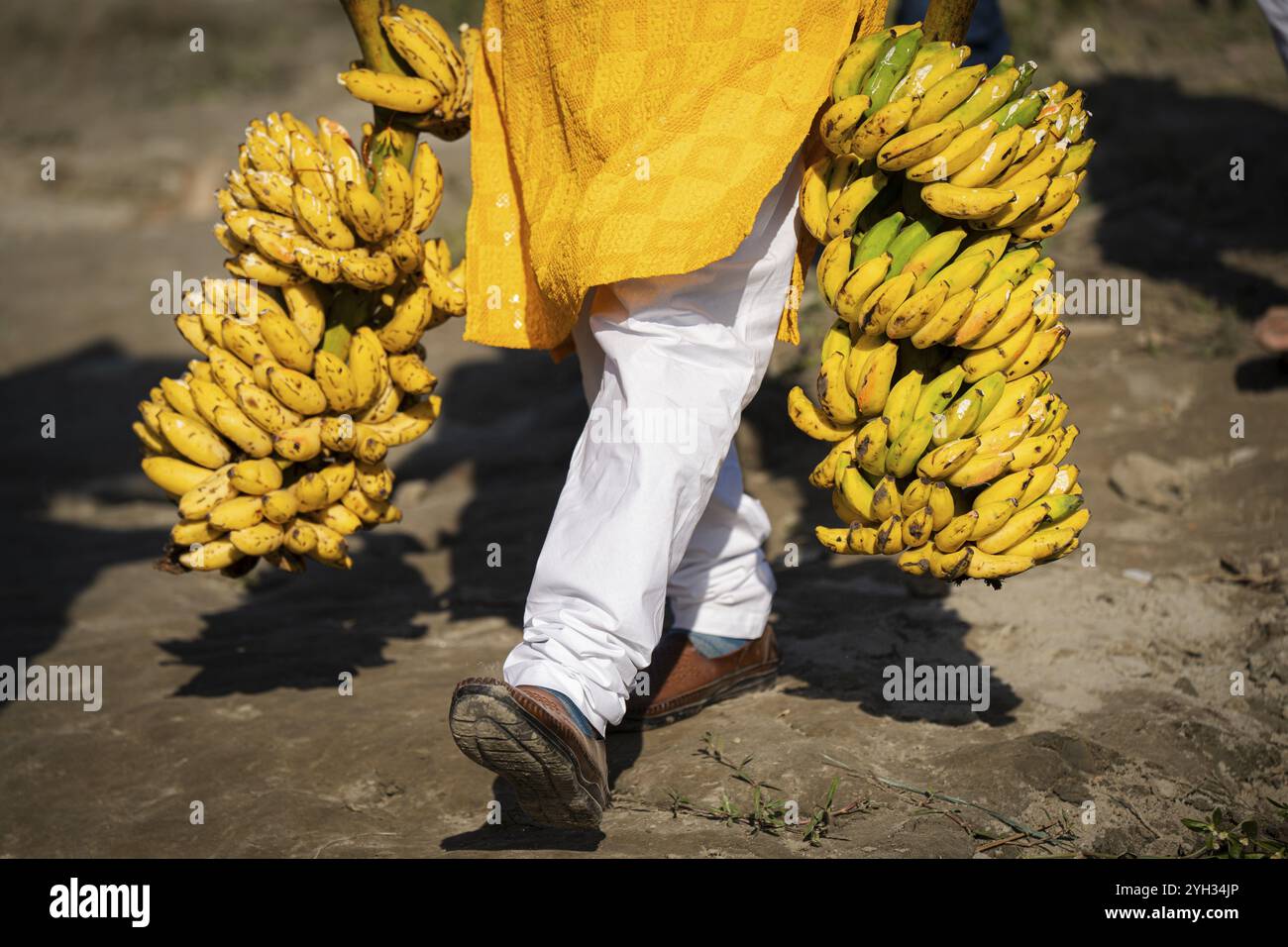 Hindu devotees perform rituals as they offer prayers to the Sun god in ...